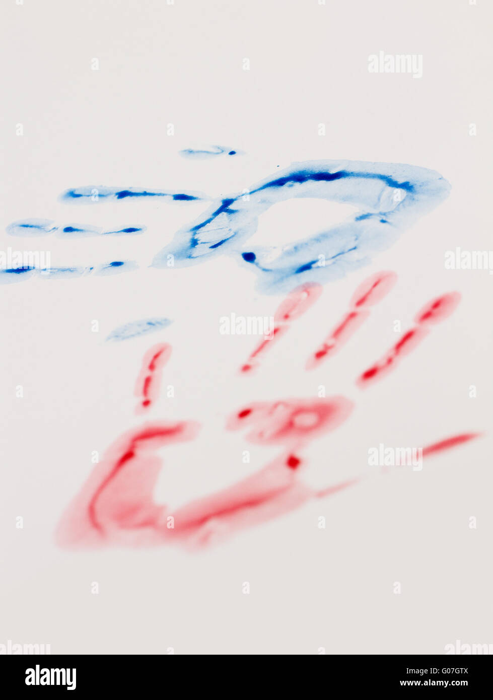 Blue and red hand-print shape over white background Stock Photo - Alamy