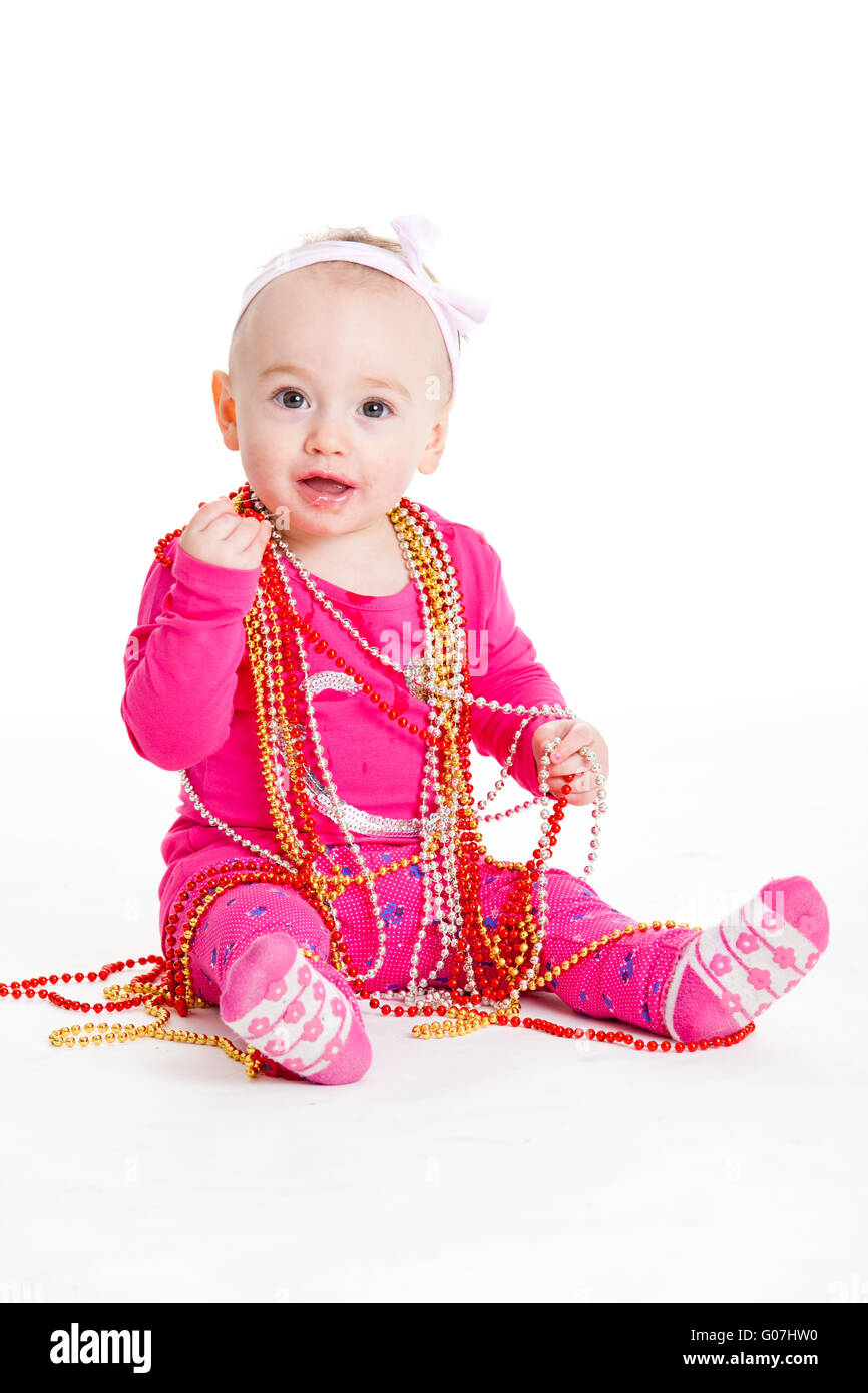 baby girl playing with beads. beautiful baby girl Stock Photo - Alamy