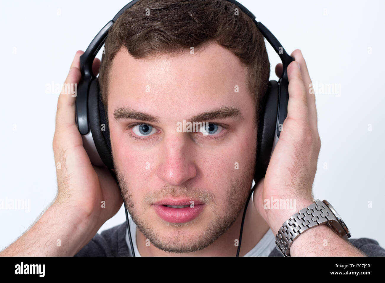 Close up shot man listening hi-res stock photography and images - Alamy