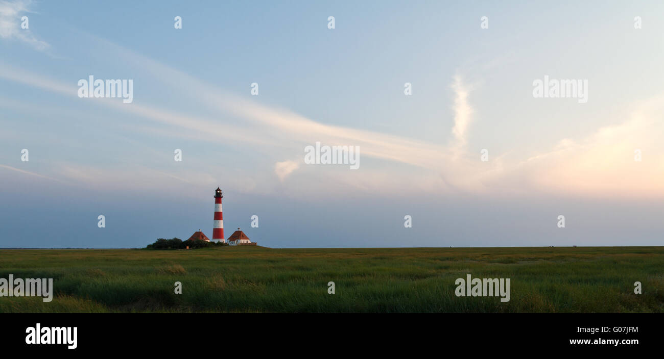 Clouds moving in on Lighthouse Stock Photo - Alamy