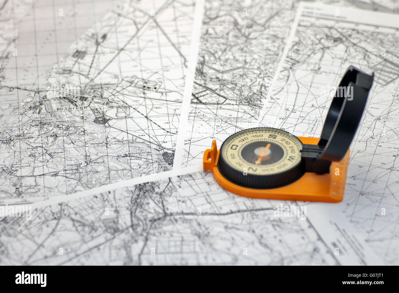 Compass on the background black-and-white city map Stock Photo - Alamy