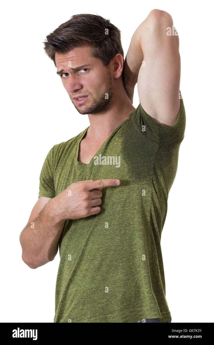 Man sweating very badly under armpit and pointing there Stock Photo - Alamy