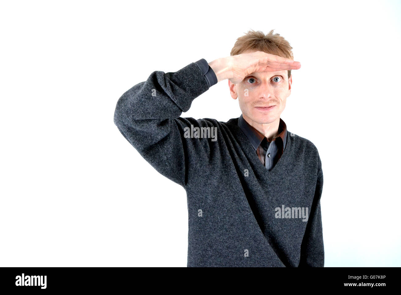Blond man of keeping a lookout Stock Photo - Alamy