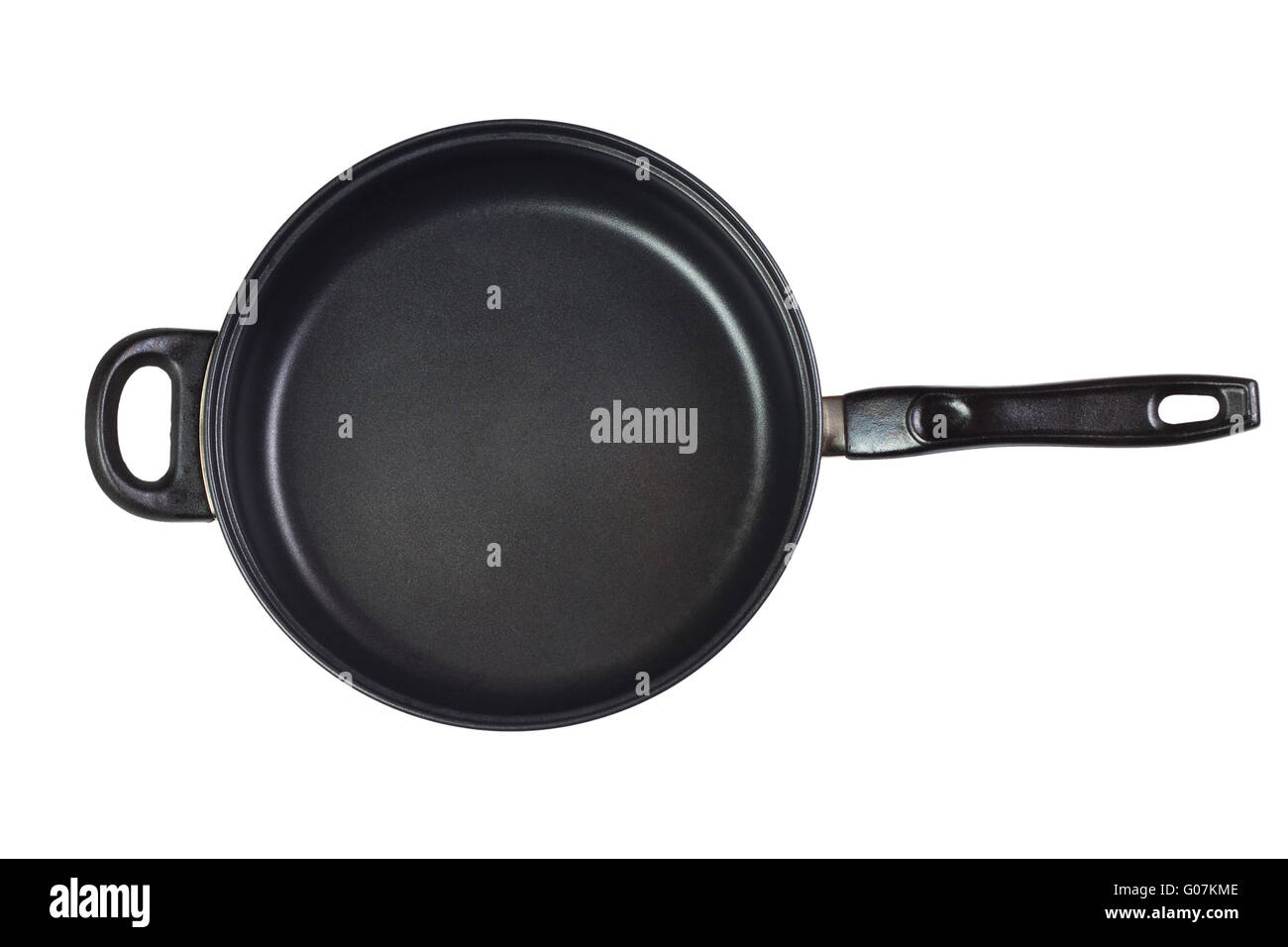 big frying pan isolated over white background Stock Photo - Alamy