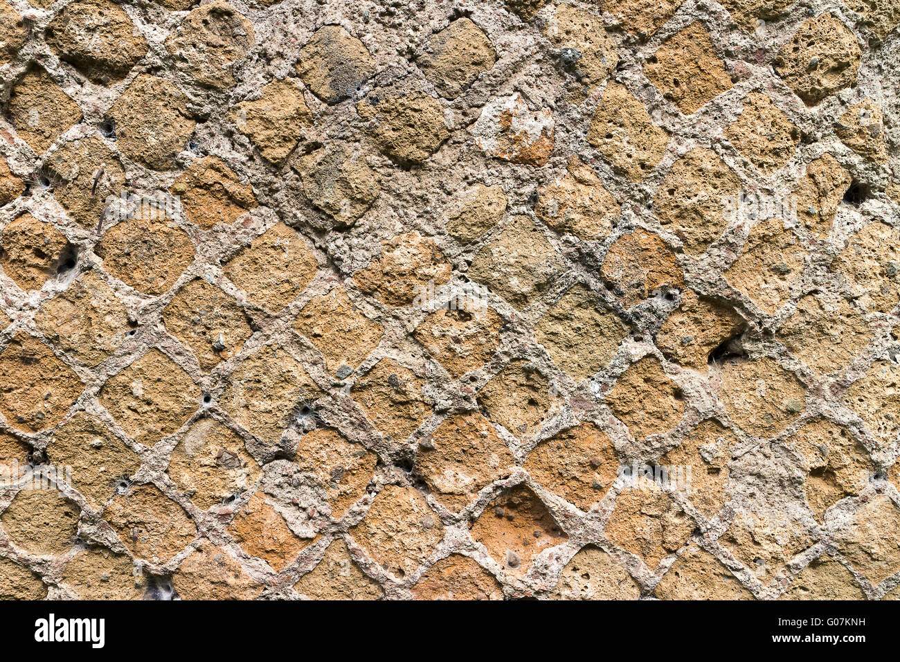 Ancient roman stone and brick wall, weathered and ruined, heritage of ...