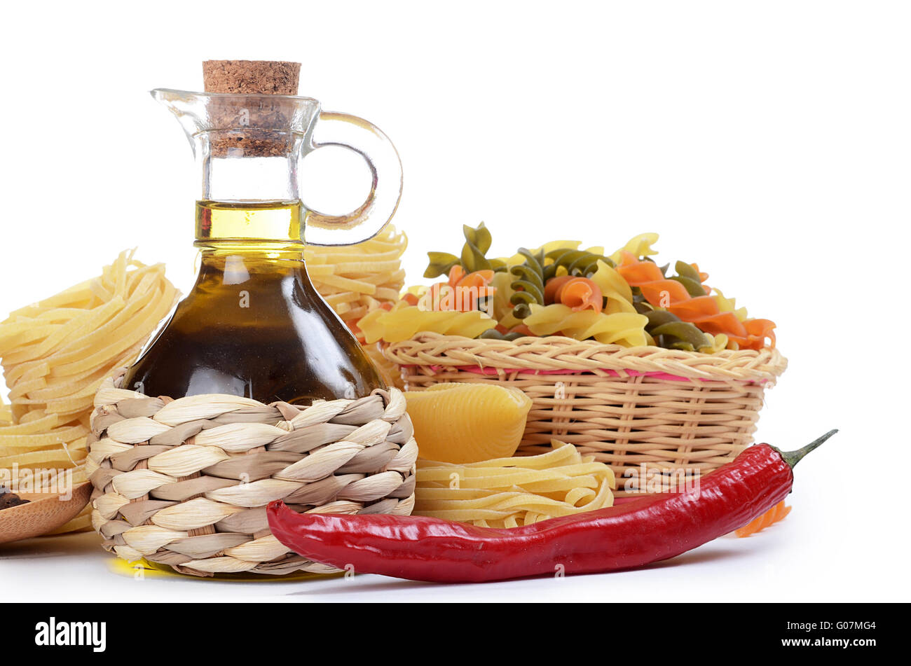 Pasta with an olive oil isolated on white background Stock Photo - Alamy