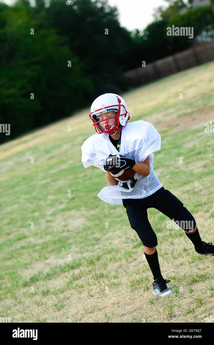 Child catching ball hi-res stock photography and images - Alamy