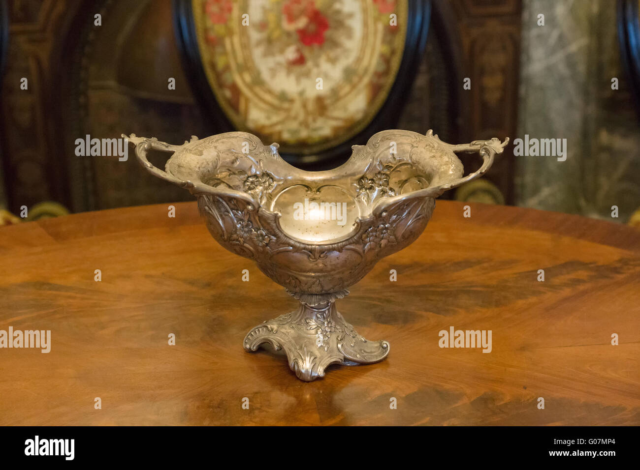 the silver bowl in an interior of the count house costs on a table ...