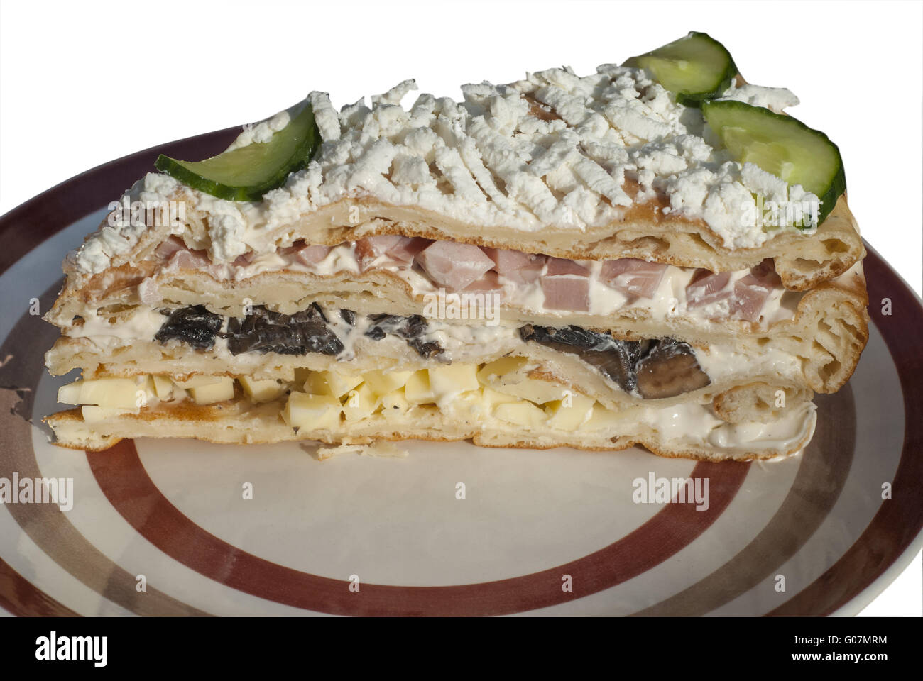 Homemade salty pancake cake piece in plate isolate Stock Photo - Alamy