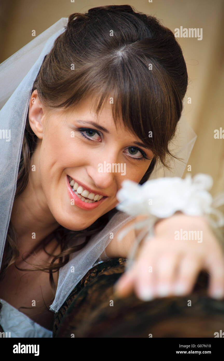 Portrait of the smile bride in home environment Stock Photo - Alamy