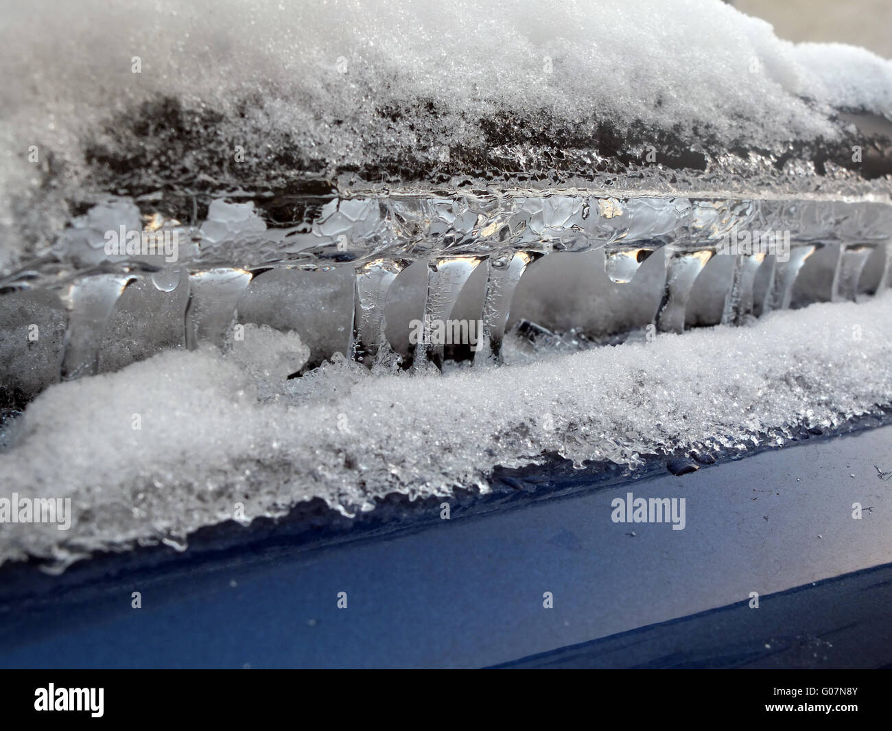 blue car with ice Stock Photo - Alamy