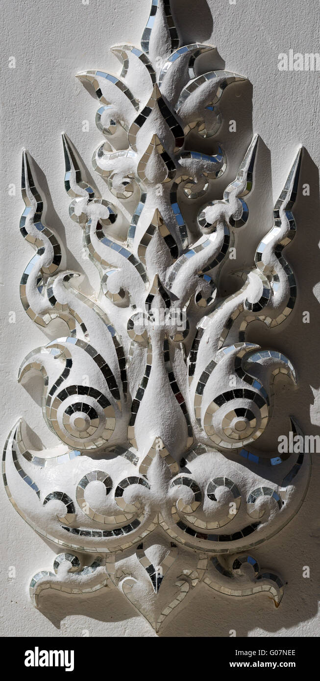 Asian sculpture of the deity face close-up of the White Temple in ...