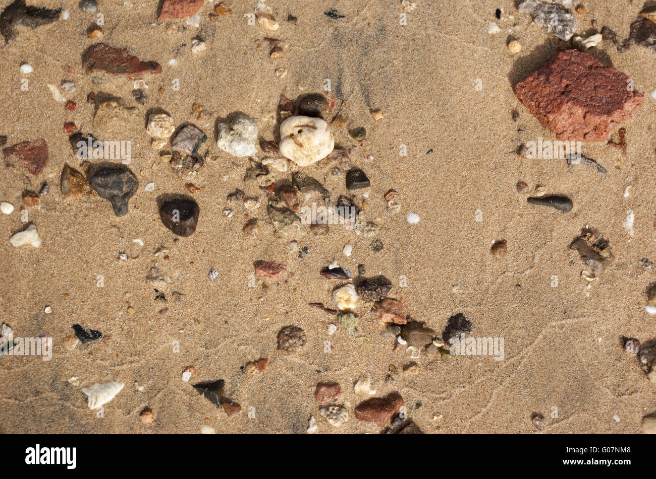 The texture of sand with stones for background Stock Photo - Alamy