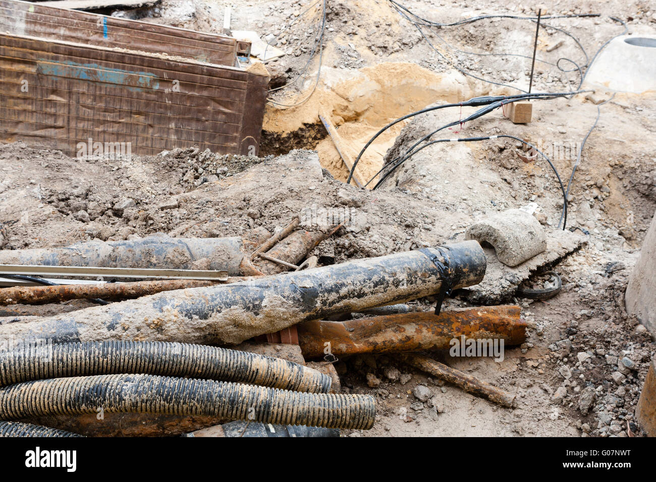 Old pipes being taken out of the surface Stock Photo - Alamy
