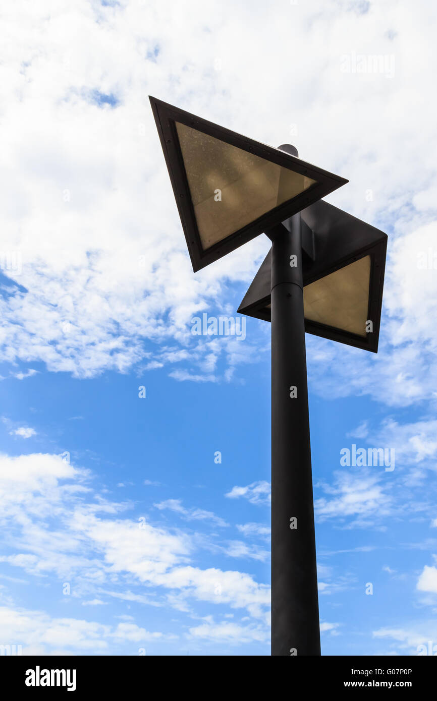 Triangle-shaped Street Lamp against White Cloud an Stock Photo - Alamy