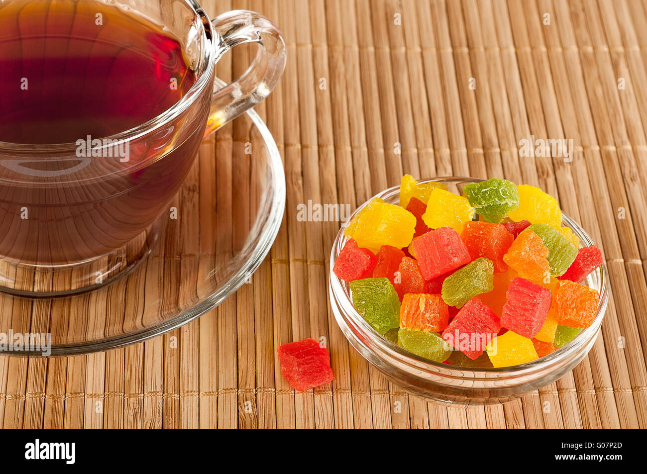 Cup of tea with candied fruits Stock Photo - Alamy