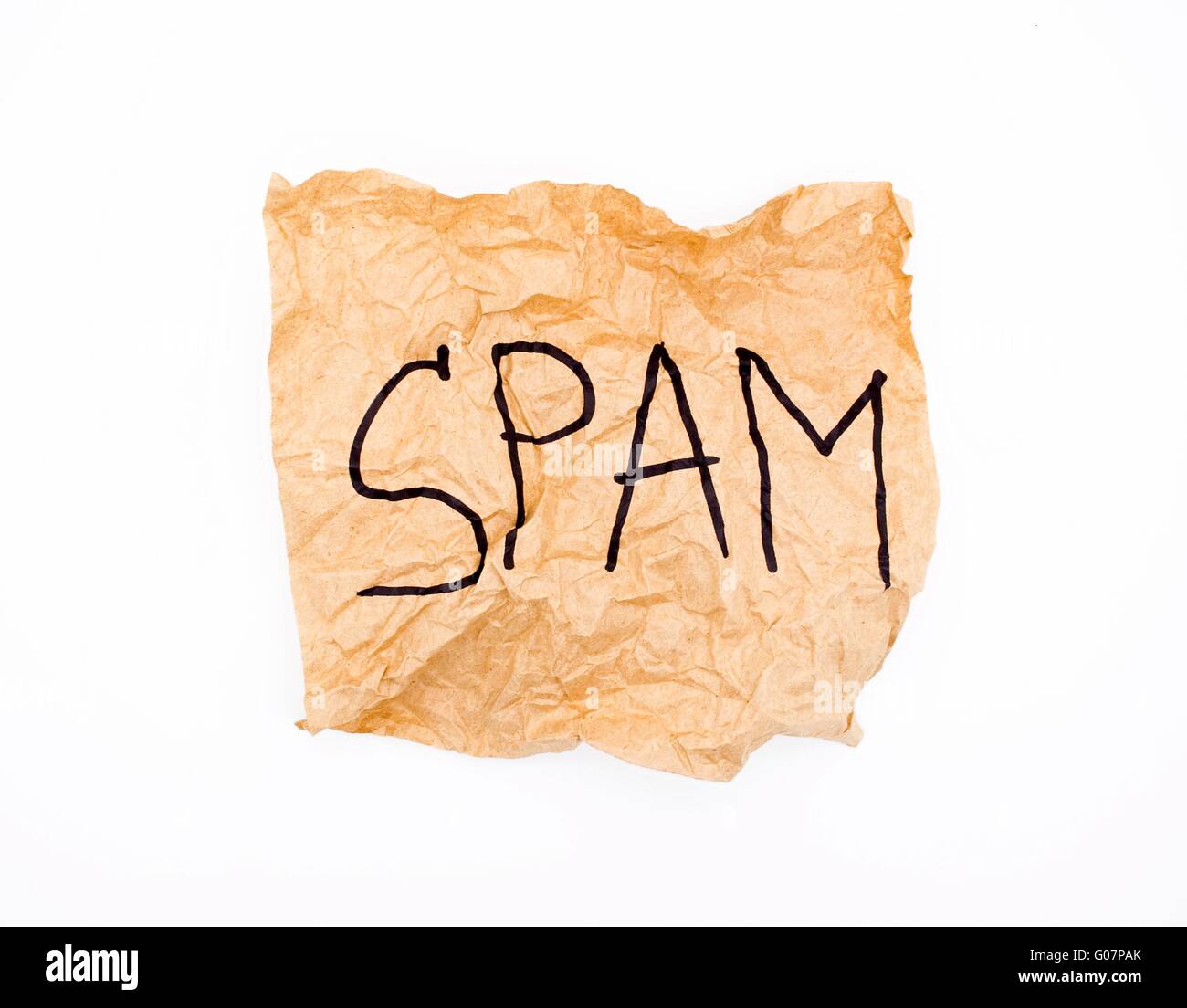 Crumpled paper with the word SPAM Stock Photo - Alamy