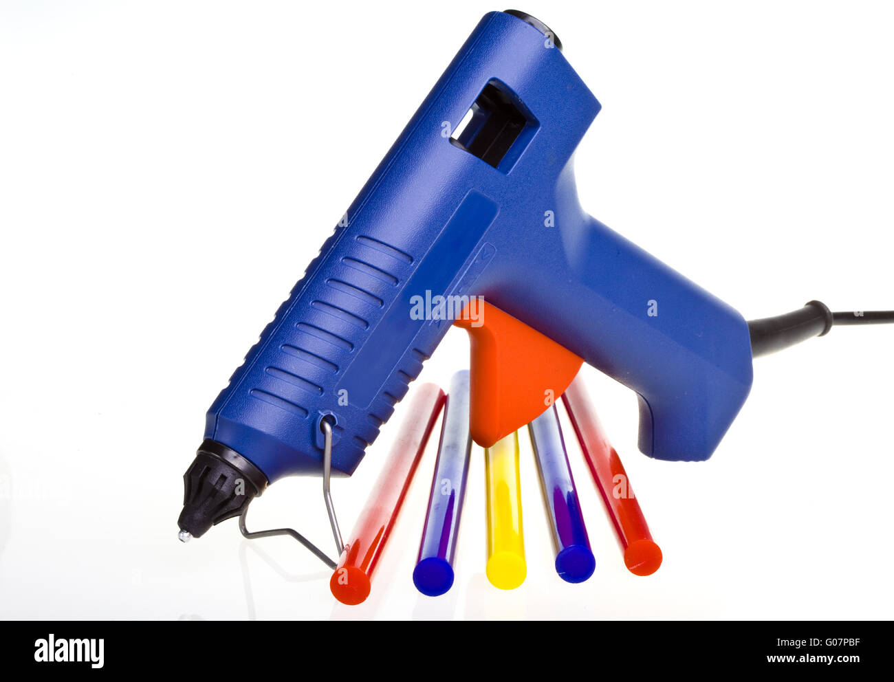 Glutinous pistol and multi-coloured glueing cores Stock Photo - Alamy