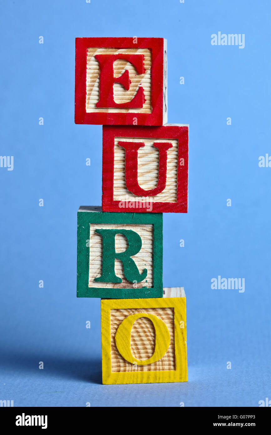 Alphabet blocks, money hi-res stock photography and images - Alamy