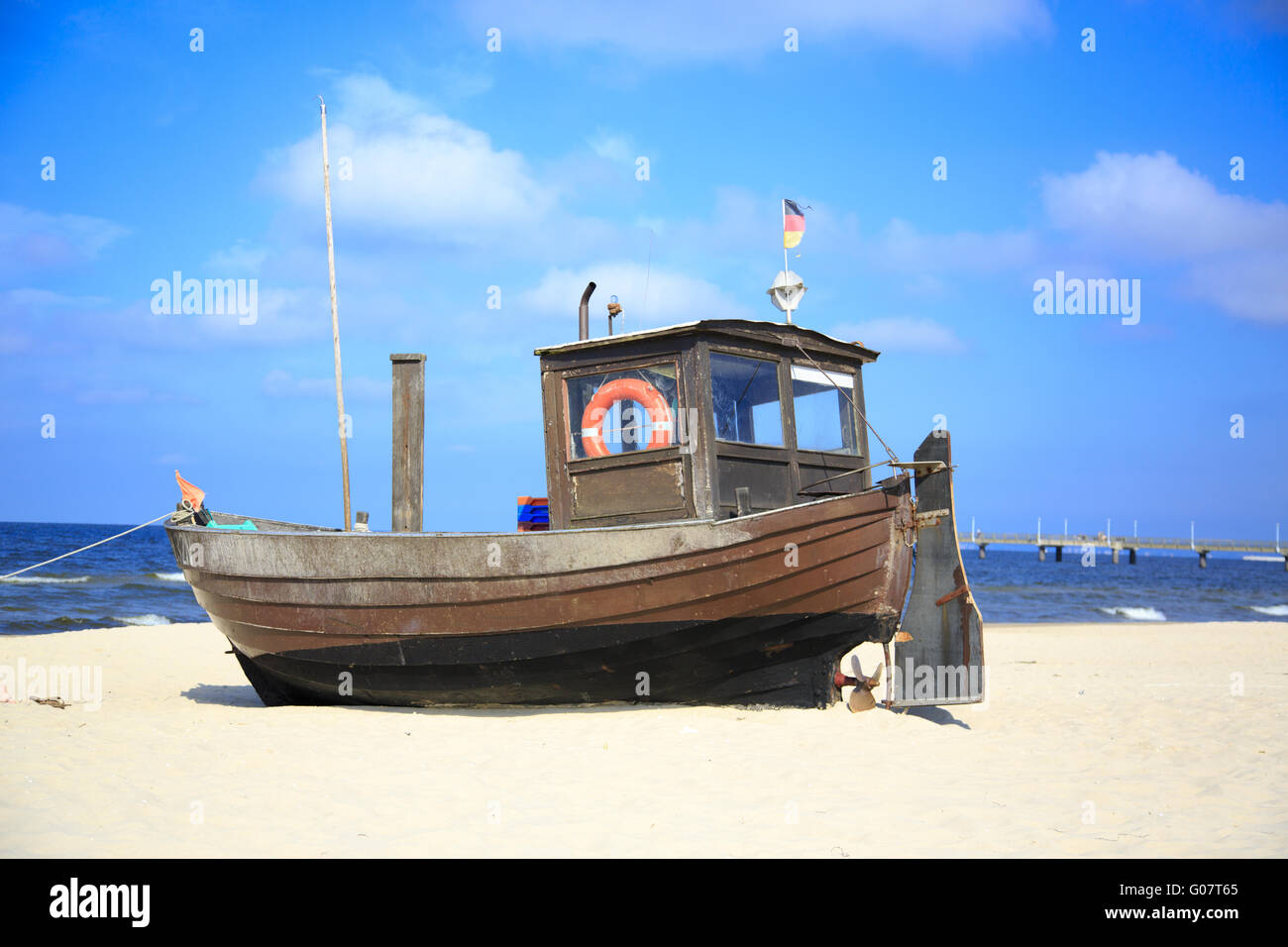 Fishing Boat on the Beach Stock Photo - Alamy