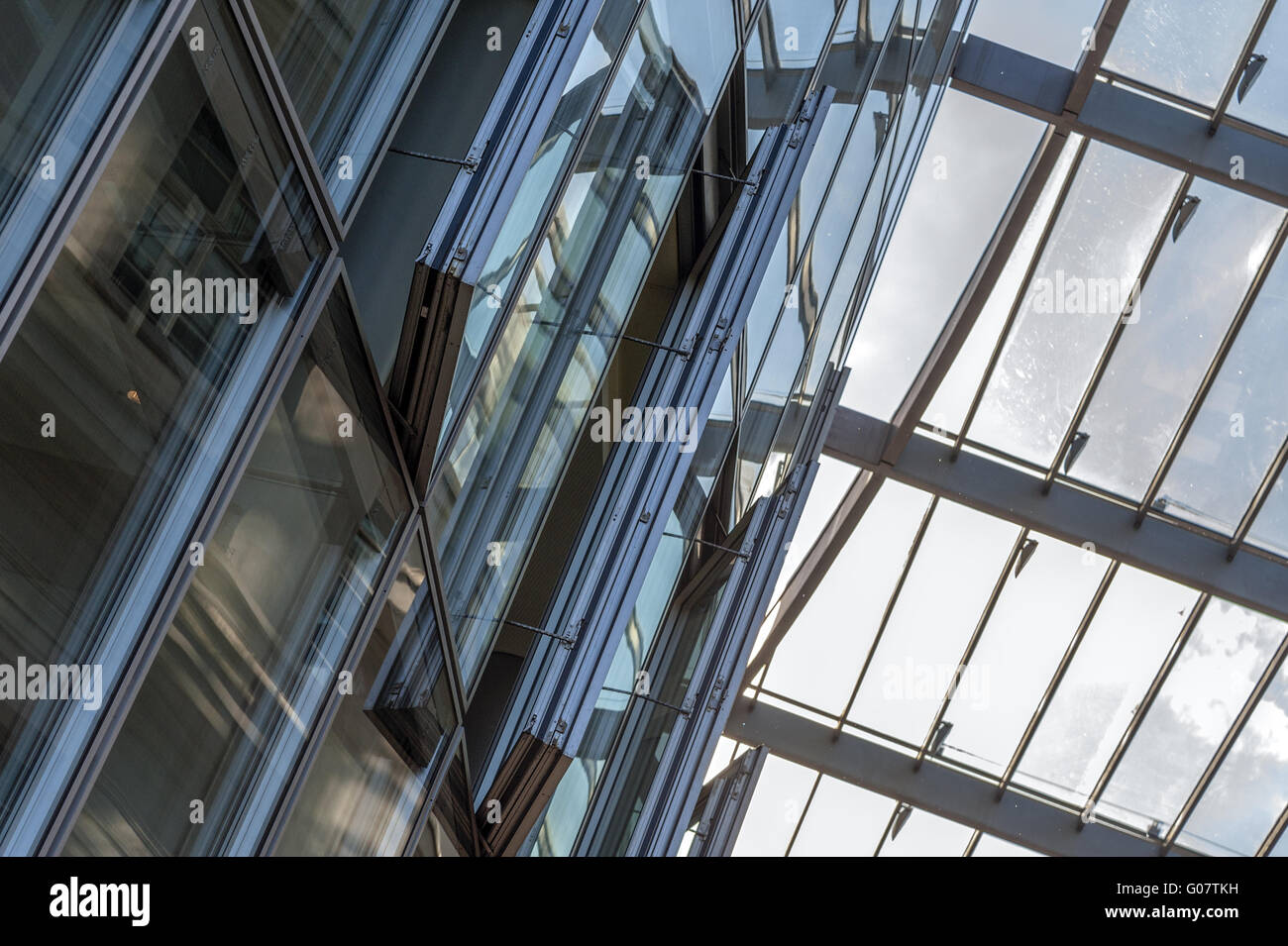 Front window of a tall building with a glass roof Stock Photo - Alamy