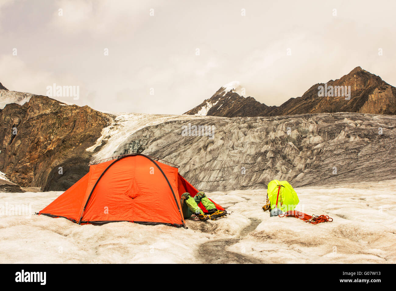 The climber has a rest lying in tent on glacier Stock Photo - Alamy