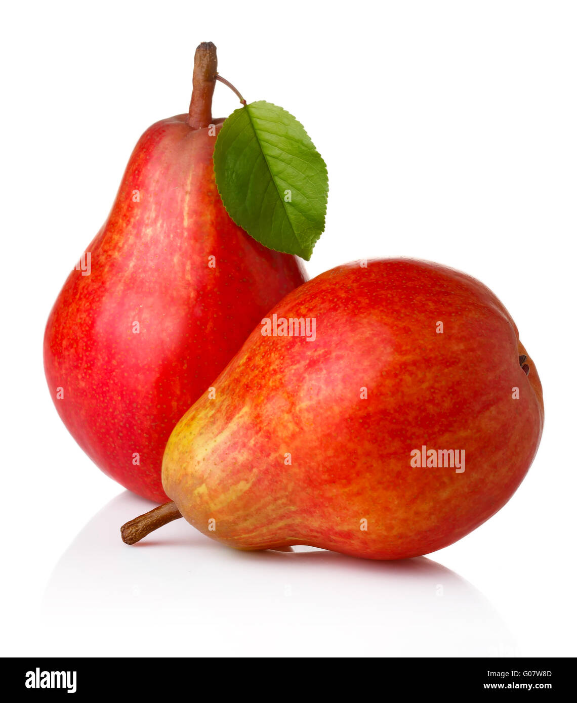 Ripe red pear fruits with green leaves isolated Stock Photo - Alamy