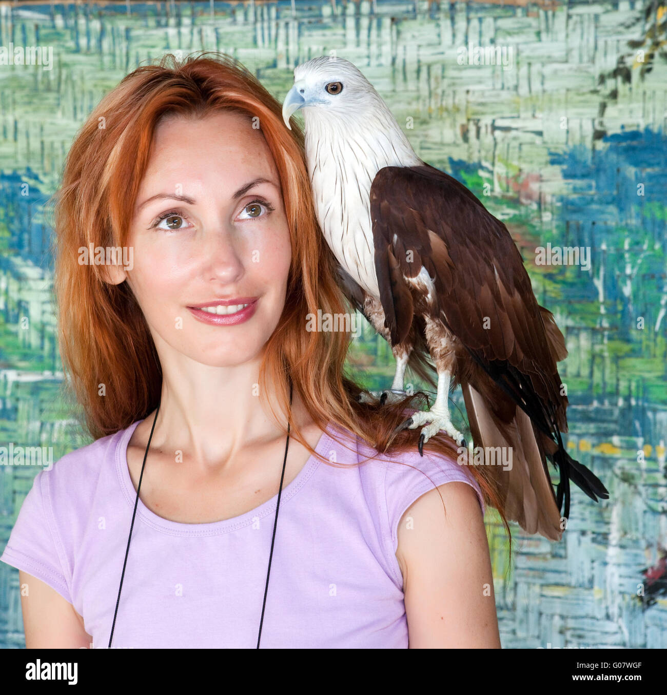 Portrait of the young woman with a prey bird on a Stock Photo - Alamy