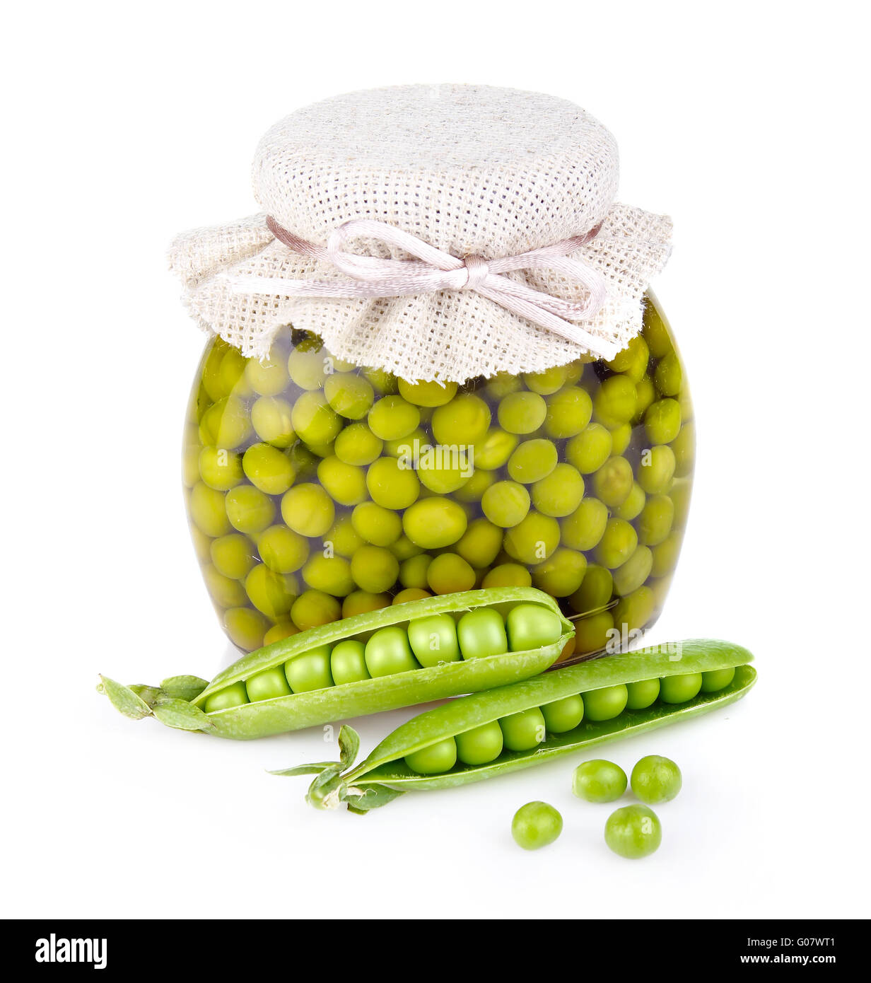 Glass jar of preserved peas and pods isolated on white Stock Photo - Alamy