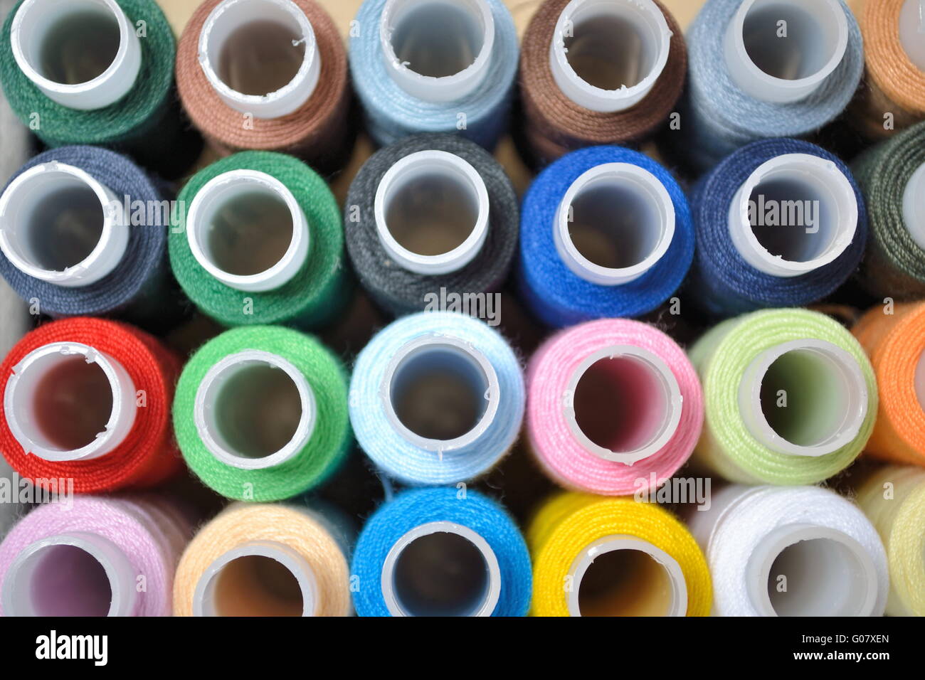 Multi-coloured threads for embroidery Stock Photo - Alamy