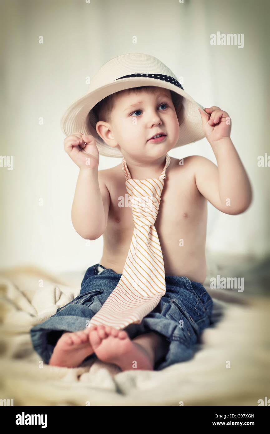 Portrait of the little boy with hat on head Stock Photo - Alamy