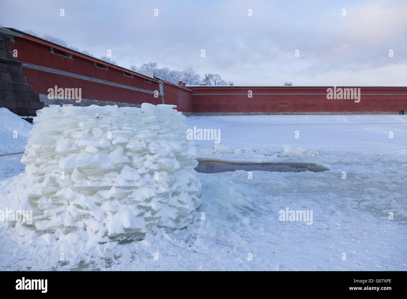 Ice hole and a wall of ice near the wall and Paul Fortress in St ...