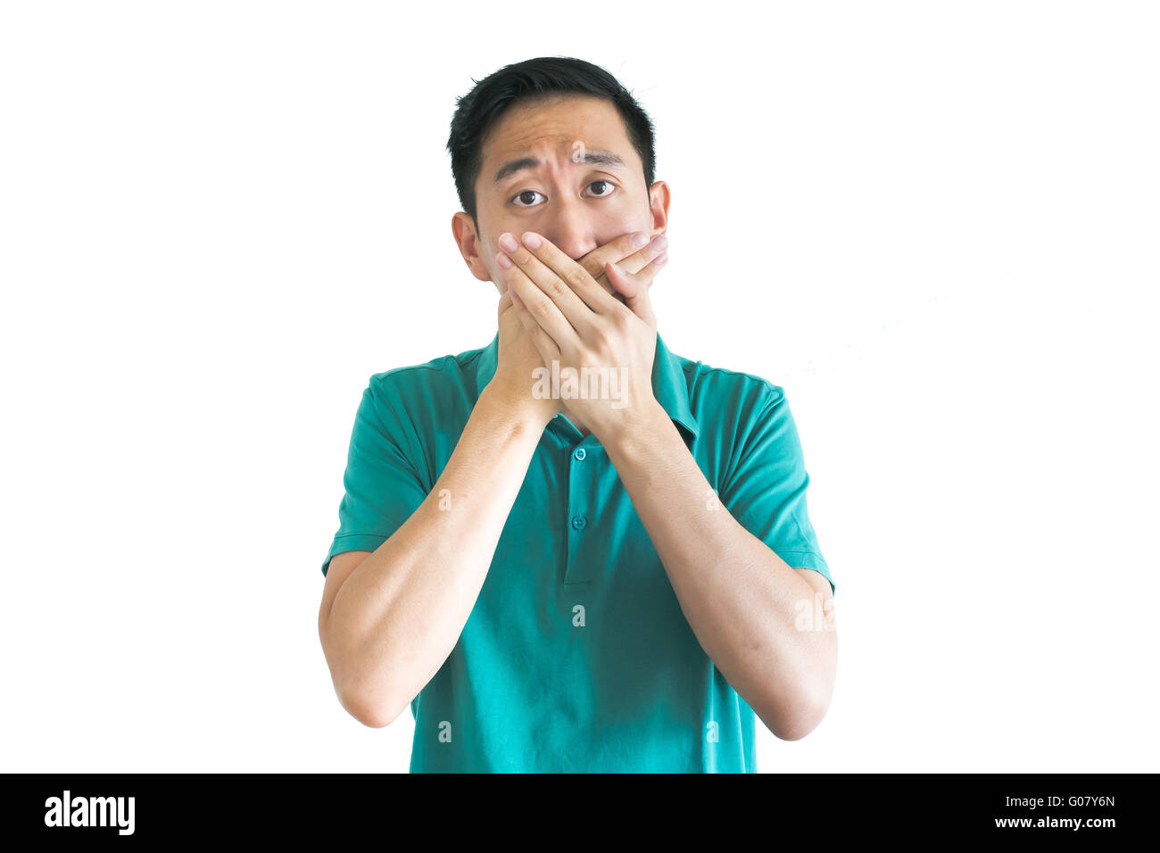 Young Asian man covering his mouth with hands Stock Photo - Alamy