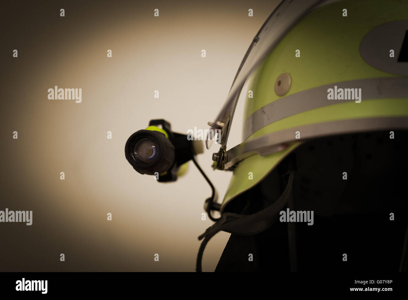 Fire Department firefighter helmet with flashlight Stock Photo - Alamy