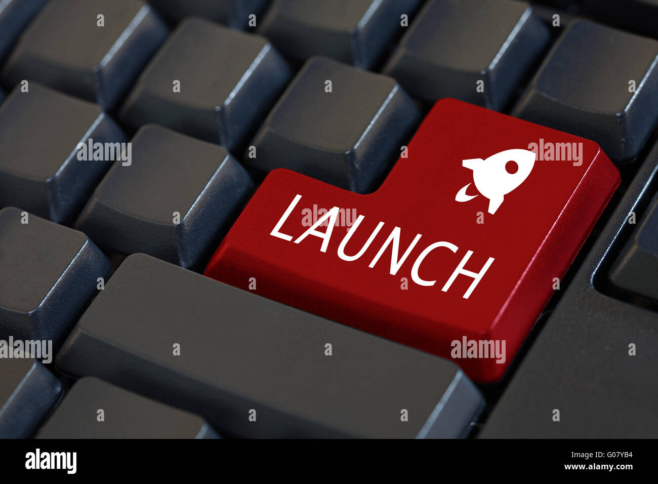 'Launch' and its icon on enter keyboard Stock Photo - Alamy