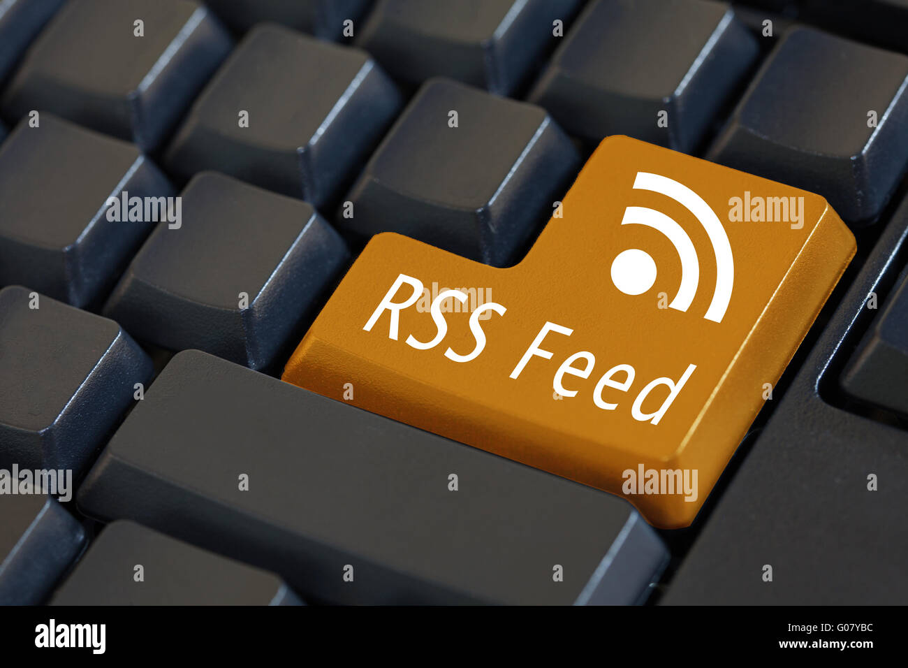 Word 'RSS feed' on enter keyboard Stock Photo - Alamy