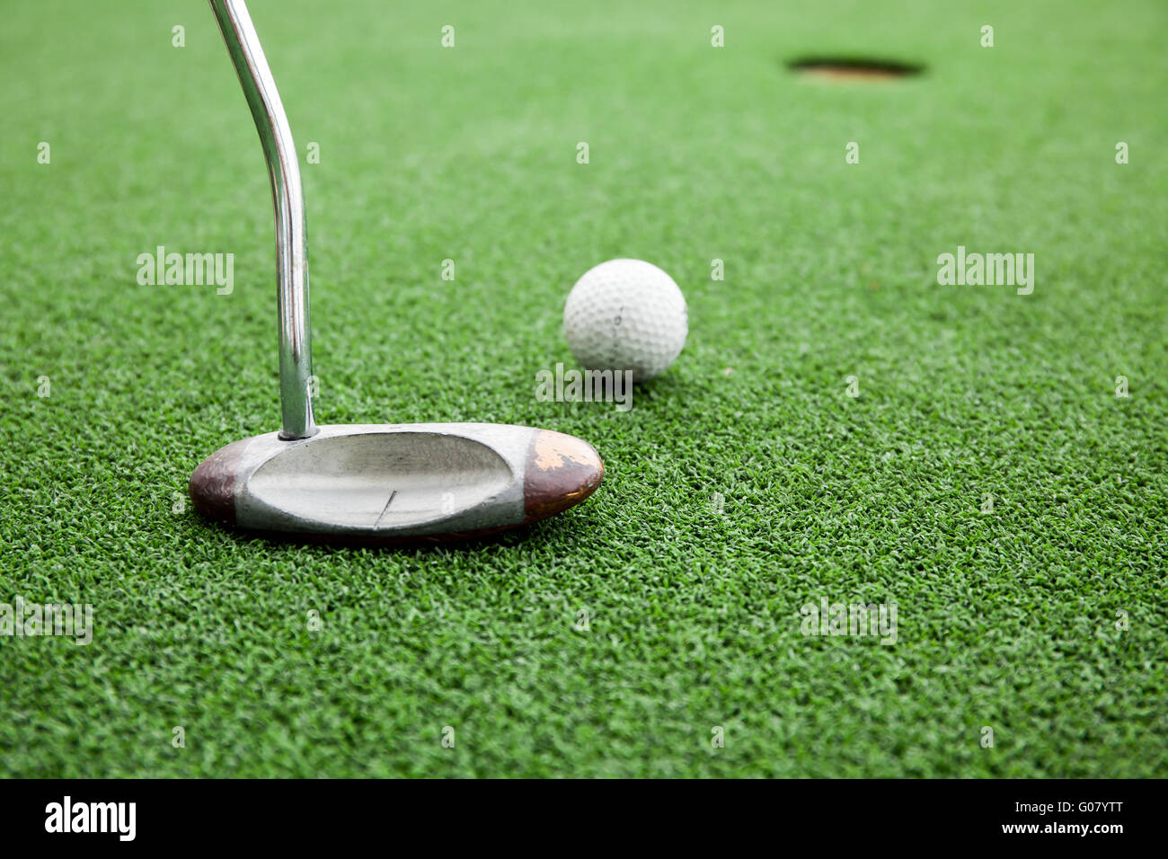 Close-up of golfer playing a golf in green grass field Stock Photo - Alamy