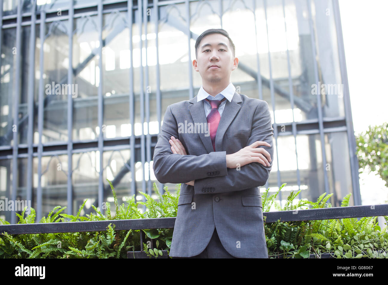 Ambitious Asian Business Person Standing Stock Photo - Alamy