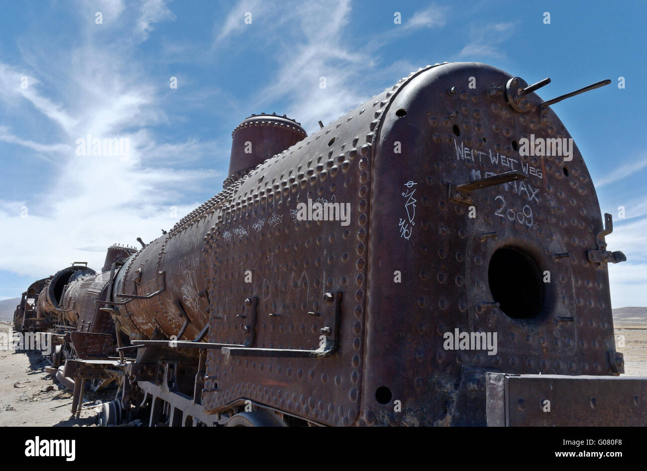 Abandoned trains graveyard in the desert in Bolivia near Uyuni Stock ...