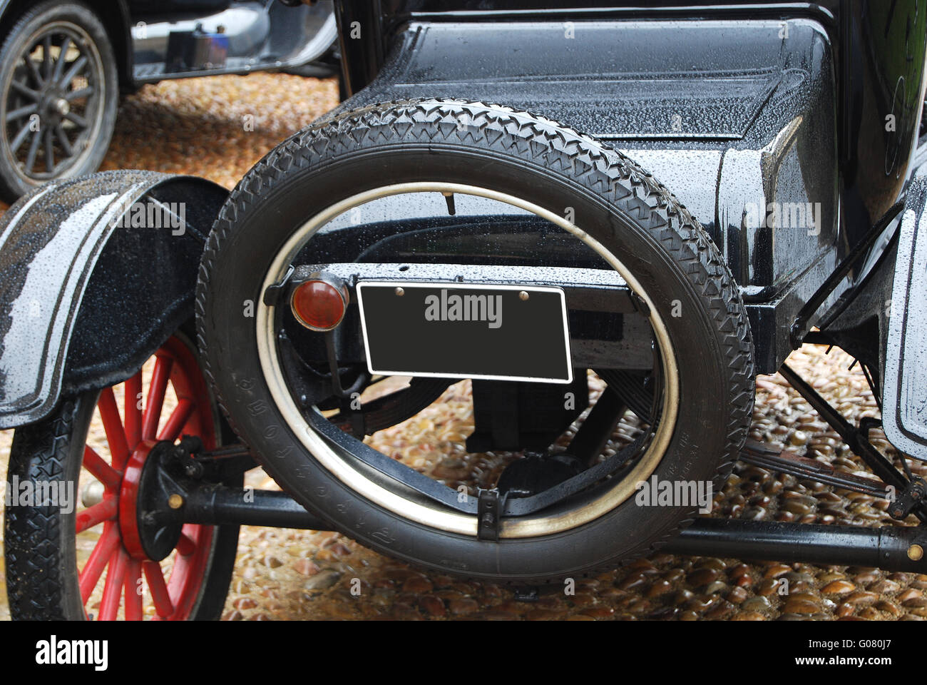 Black retro car back side, spare wheel closeup Stock Photo - Alamy