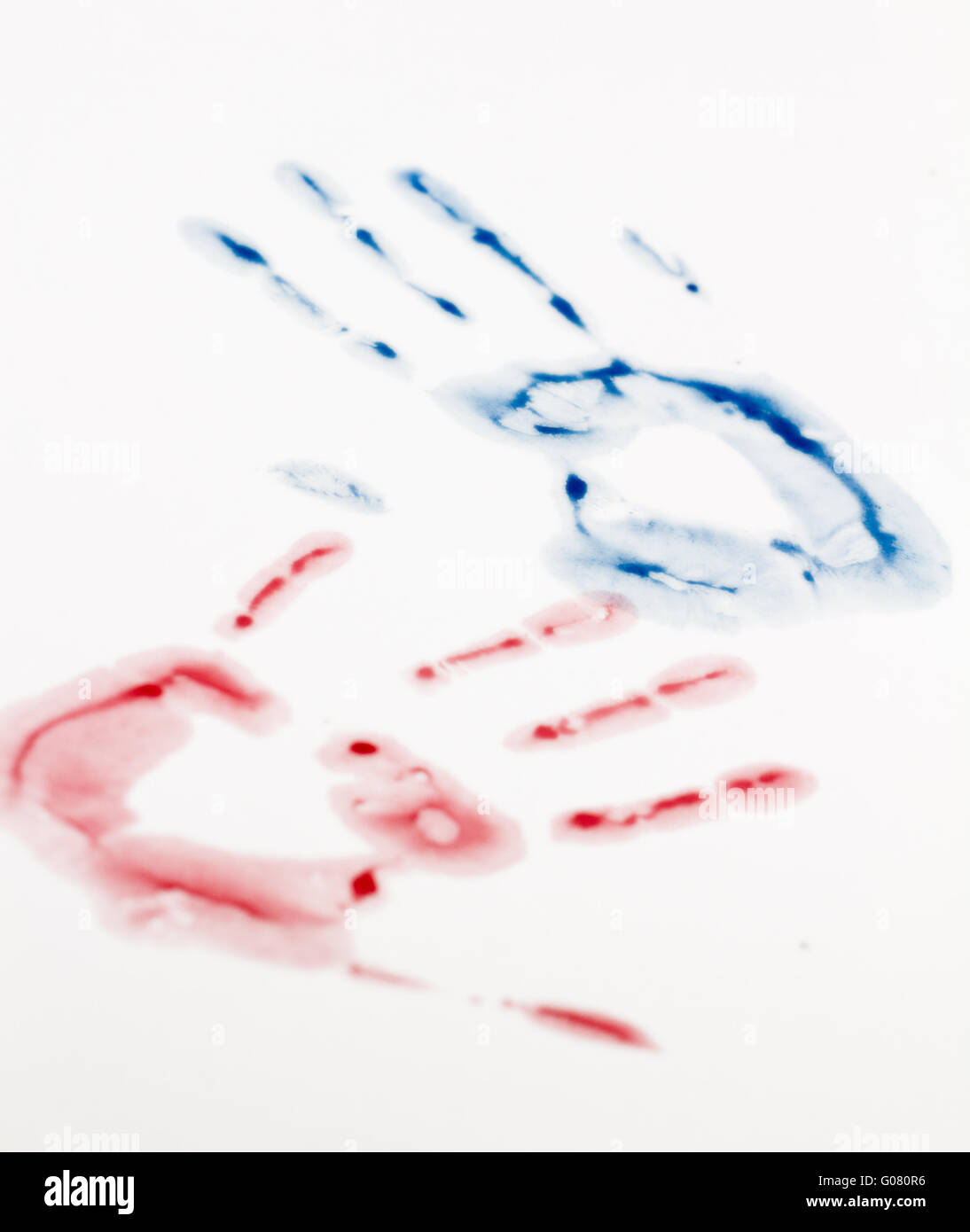 Blue and red hand-print shape over white background Stock Photo - Alamy