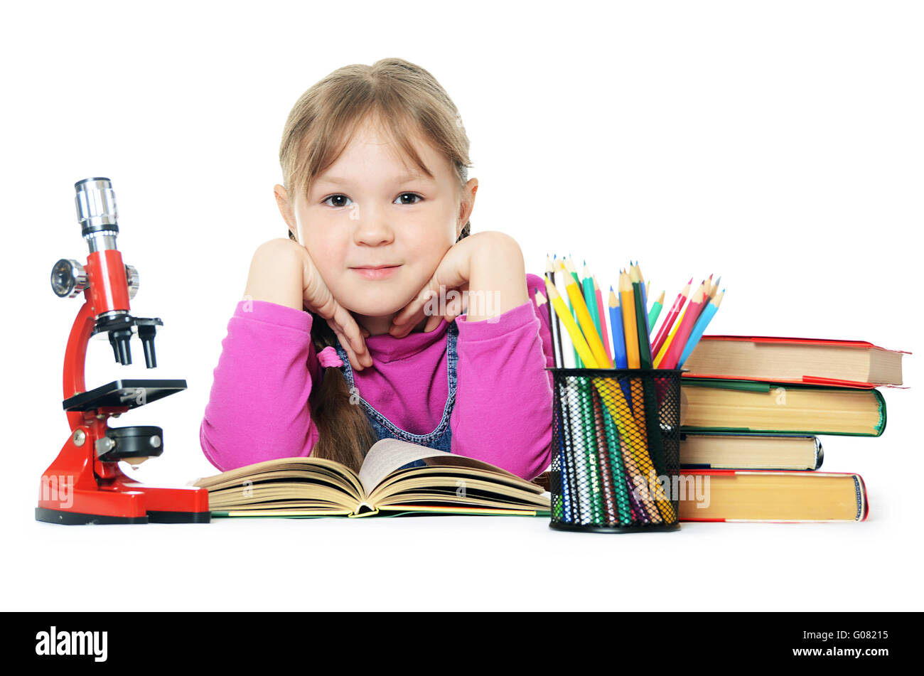 The little girl learn isolated on white background Stock Photo - Alamy