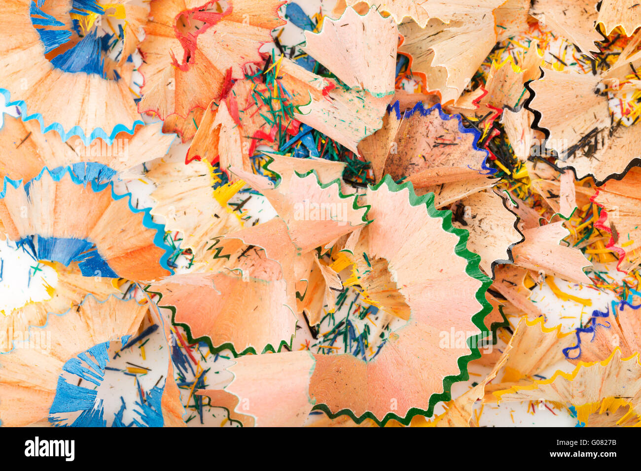 Background of wood shavings from grinding crayons Stock Photo - Alamy