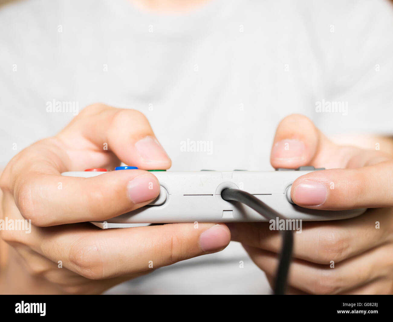 Hand holding playstation controller hi-res stock photography and images ...