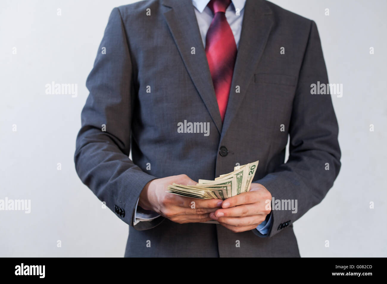 Businessman counting bill notes in white isolated background Stock ...
