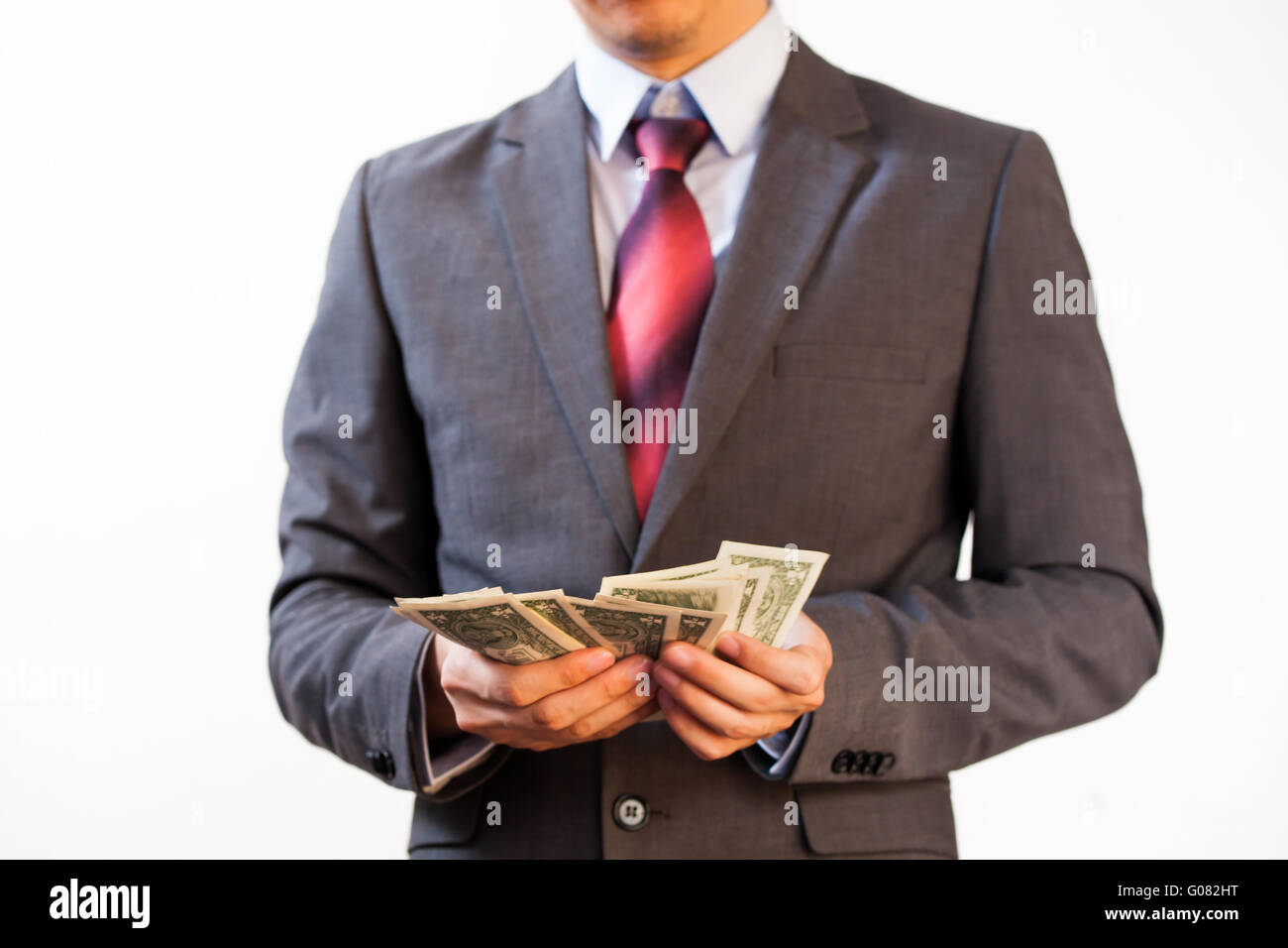 Business man counting money on white isolated background Stock Photo ...