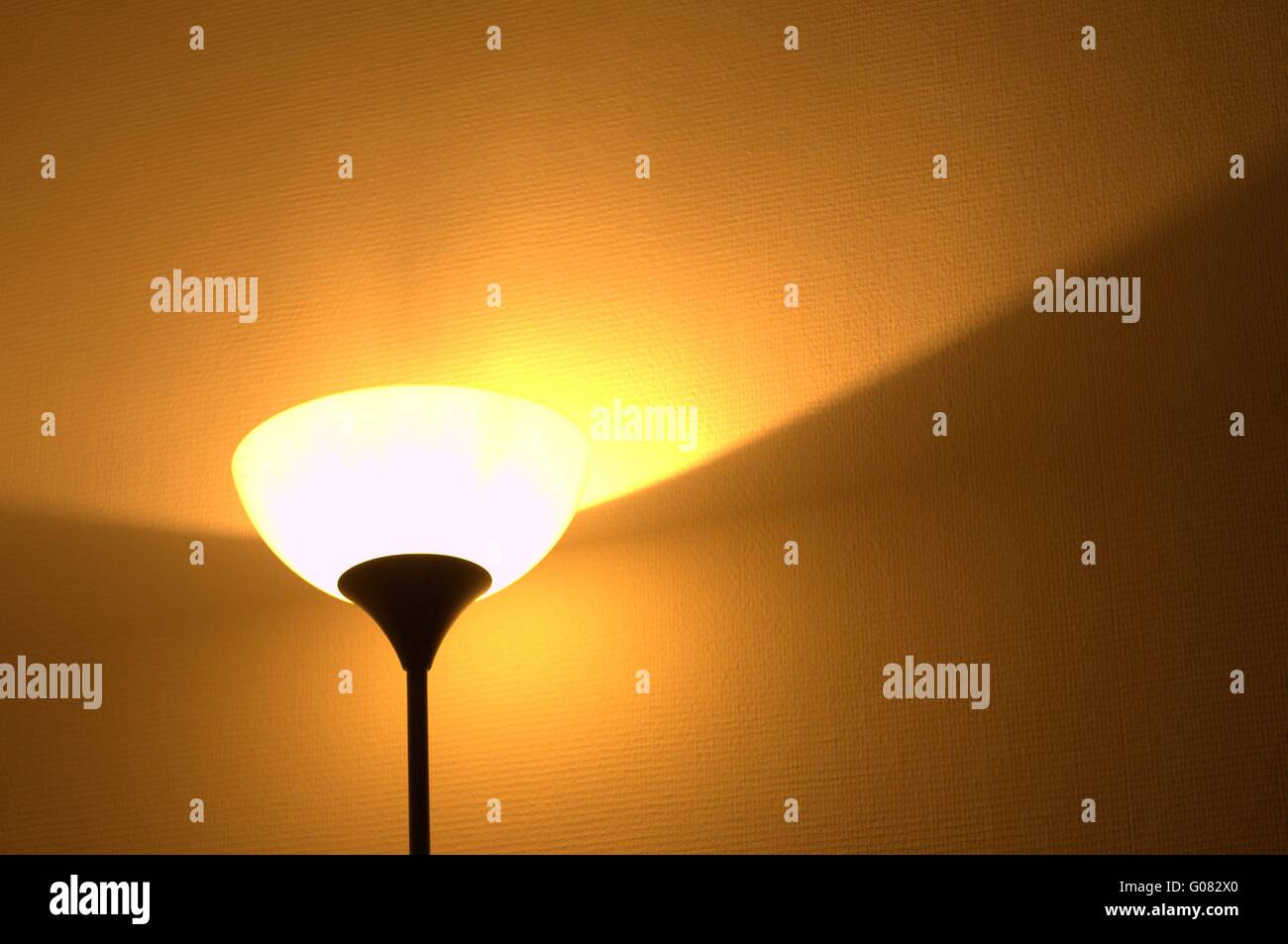 Lamp emitting a dim light Stock Photo - Alamy