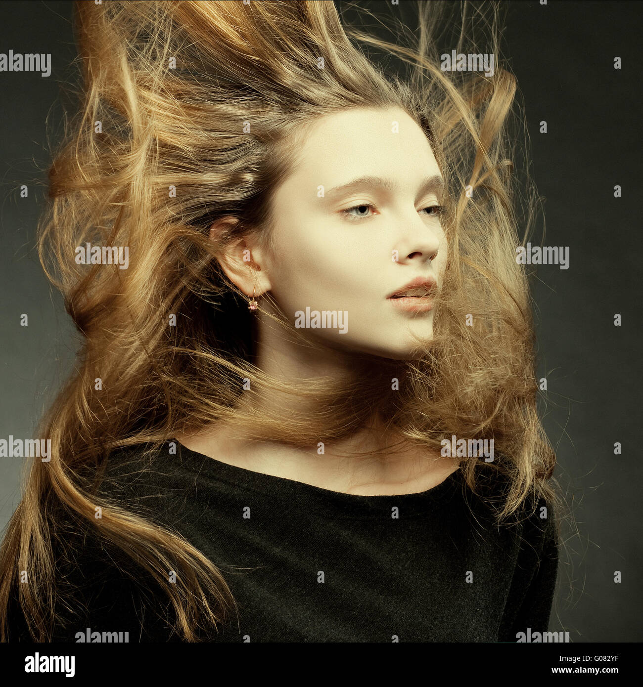 The beautiful girl with a flying hair Stock Photo - Alamy