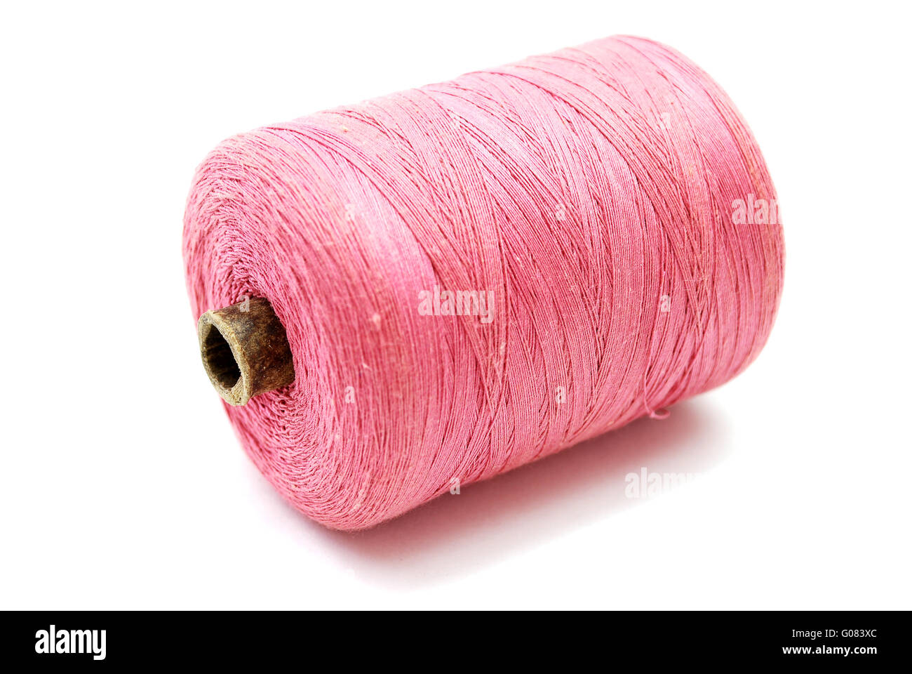 Pink Thread Spool Stock Photo - Alamy