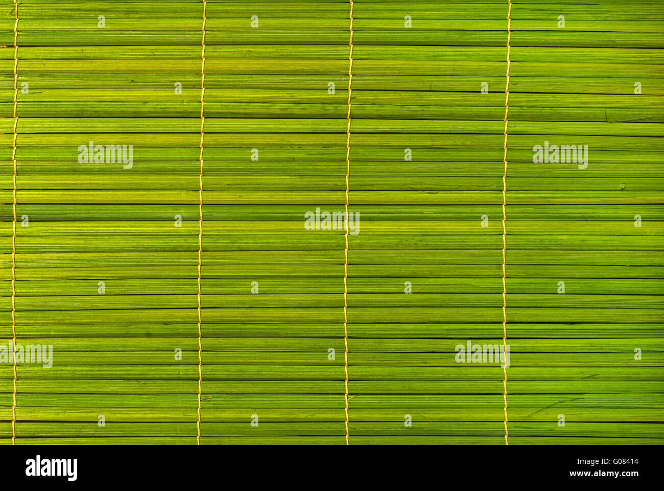 Green reed mat texture closeup as background Stock Photo - Alamy